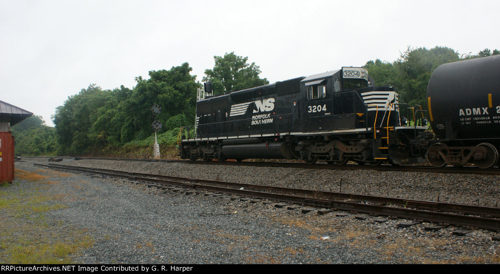 West of Lynchburg on the N&W side at Forest, VA, now. V04 local gets out of the way of the 611 ...